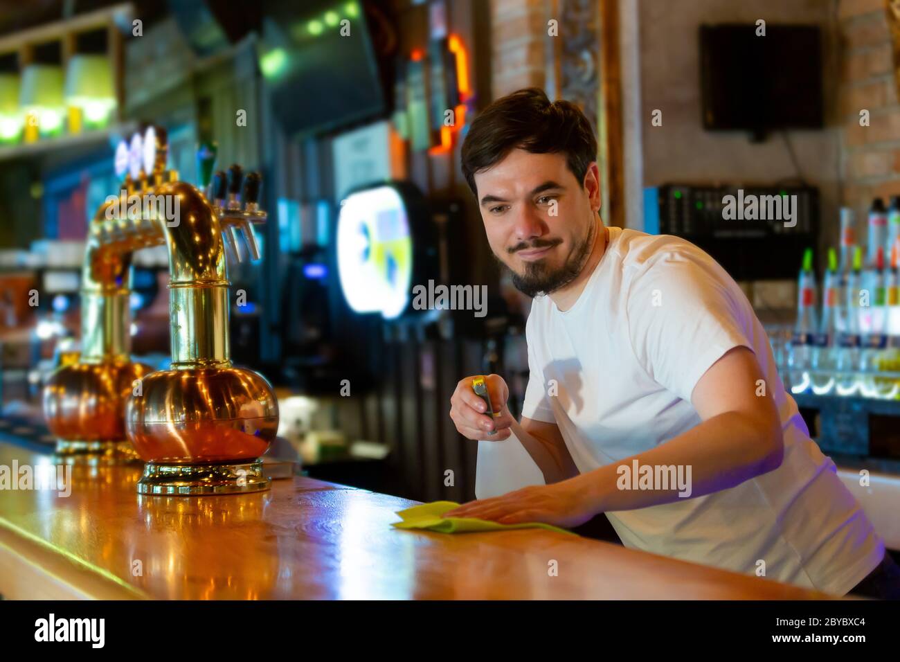 Portrait young waitress cleaning hi-res stock photography and images ...