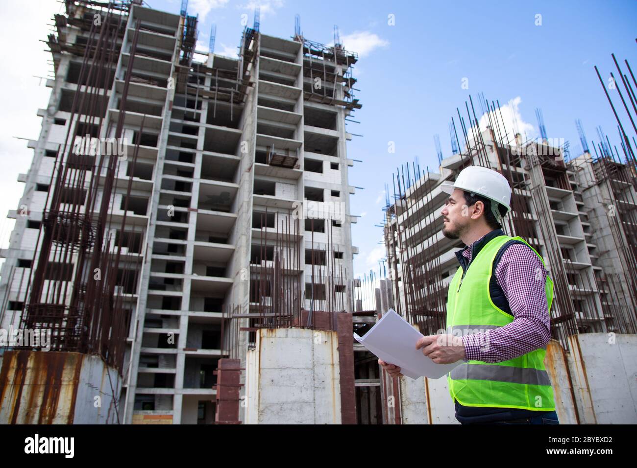 Young Engineer Working on Building Site Stock Photo - Alamy