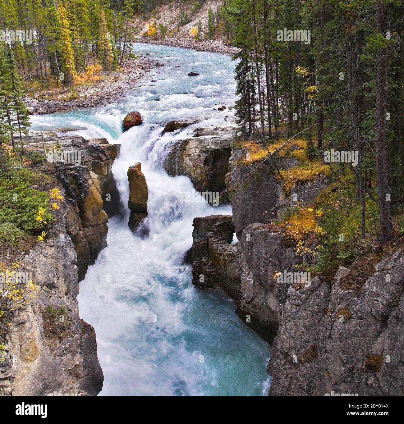 A falls in a narrow and deep canyon Stock Photo - Alamy