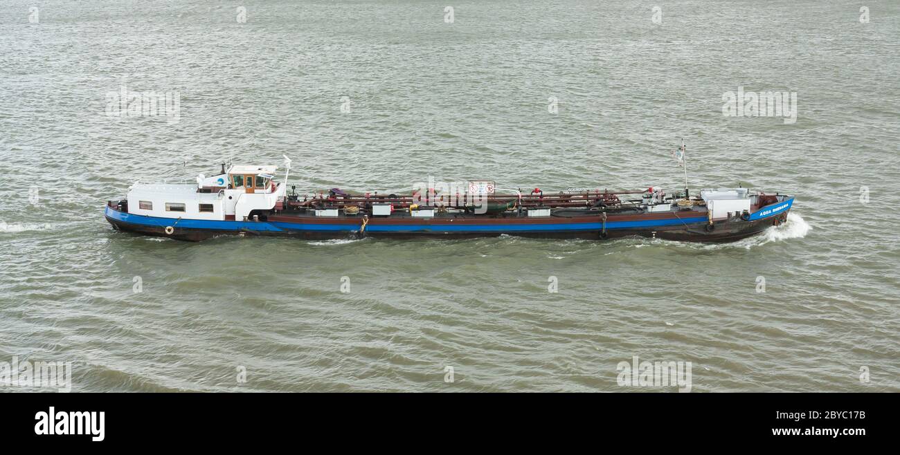 Small chemical tanker sailing in the port of Rotterdam (Holland Stock ...