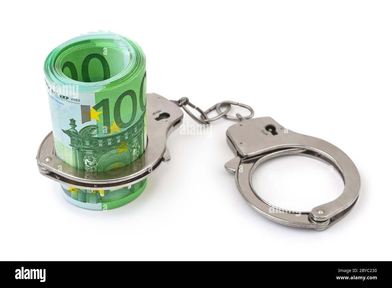 Money and handcuffs Stock Photo - Alamy