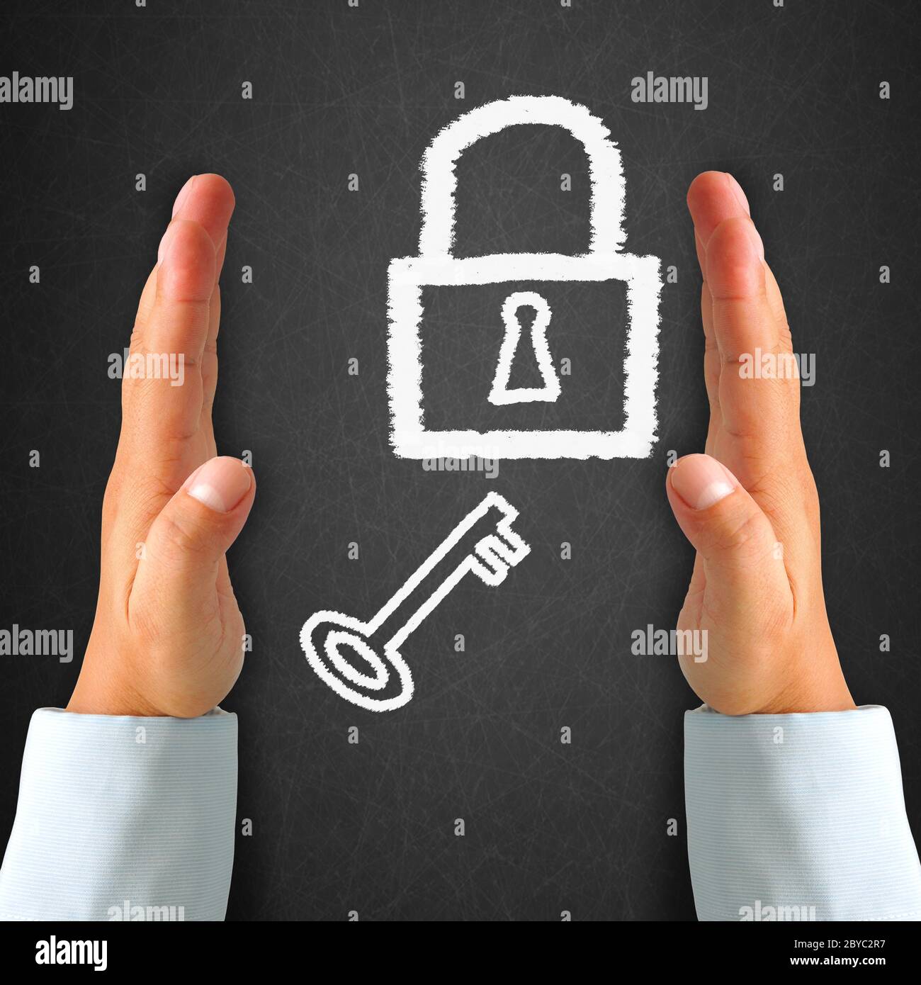 Key and locker on blackboard Stock Photo - Alamy