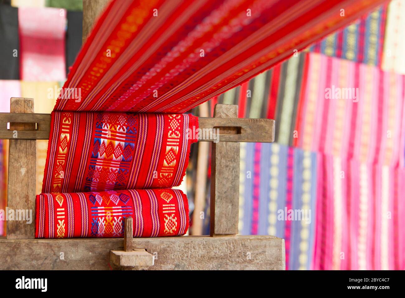 Handmade silk textile industry, silk scarf on a old machine Stock Photo ...
