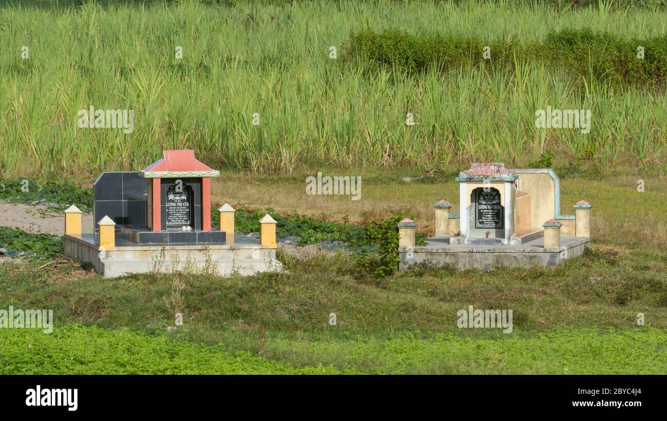 Two old graves in a field Stock Photo - Alamy