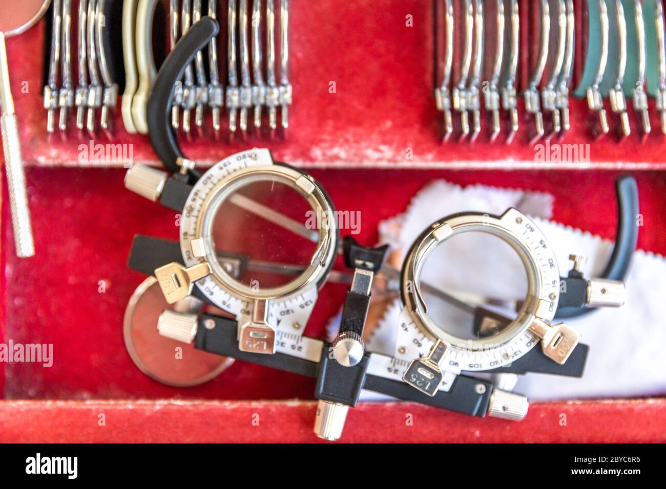 eye examination by optometrist at clinic, optical lens Stock Photo - Alamy