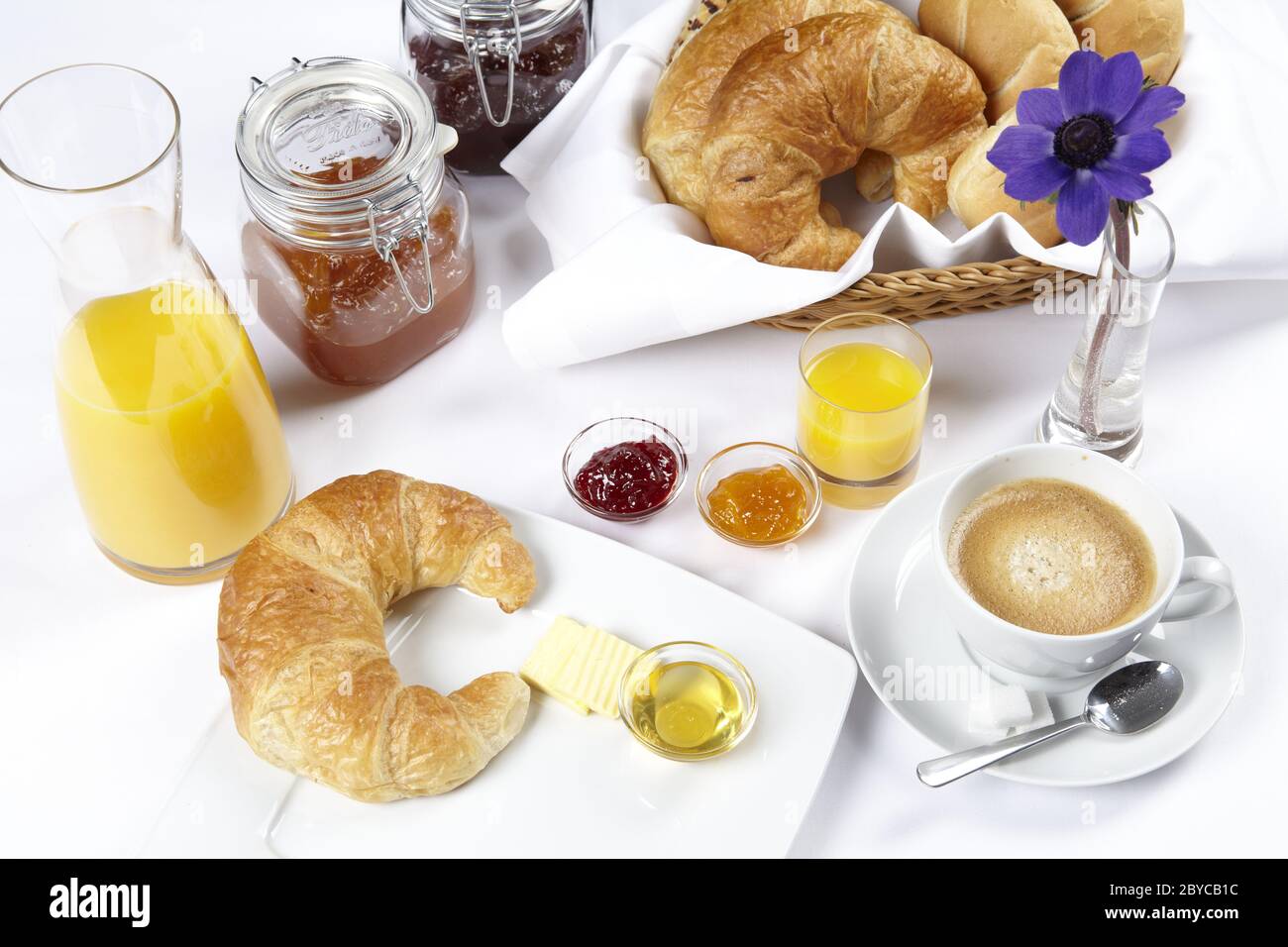 breakfast table with croissant, spread and coffee Stock Photo - Alamy