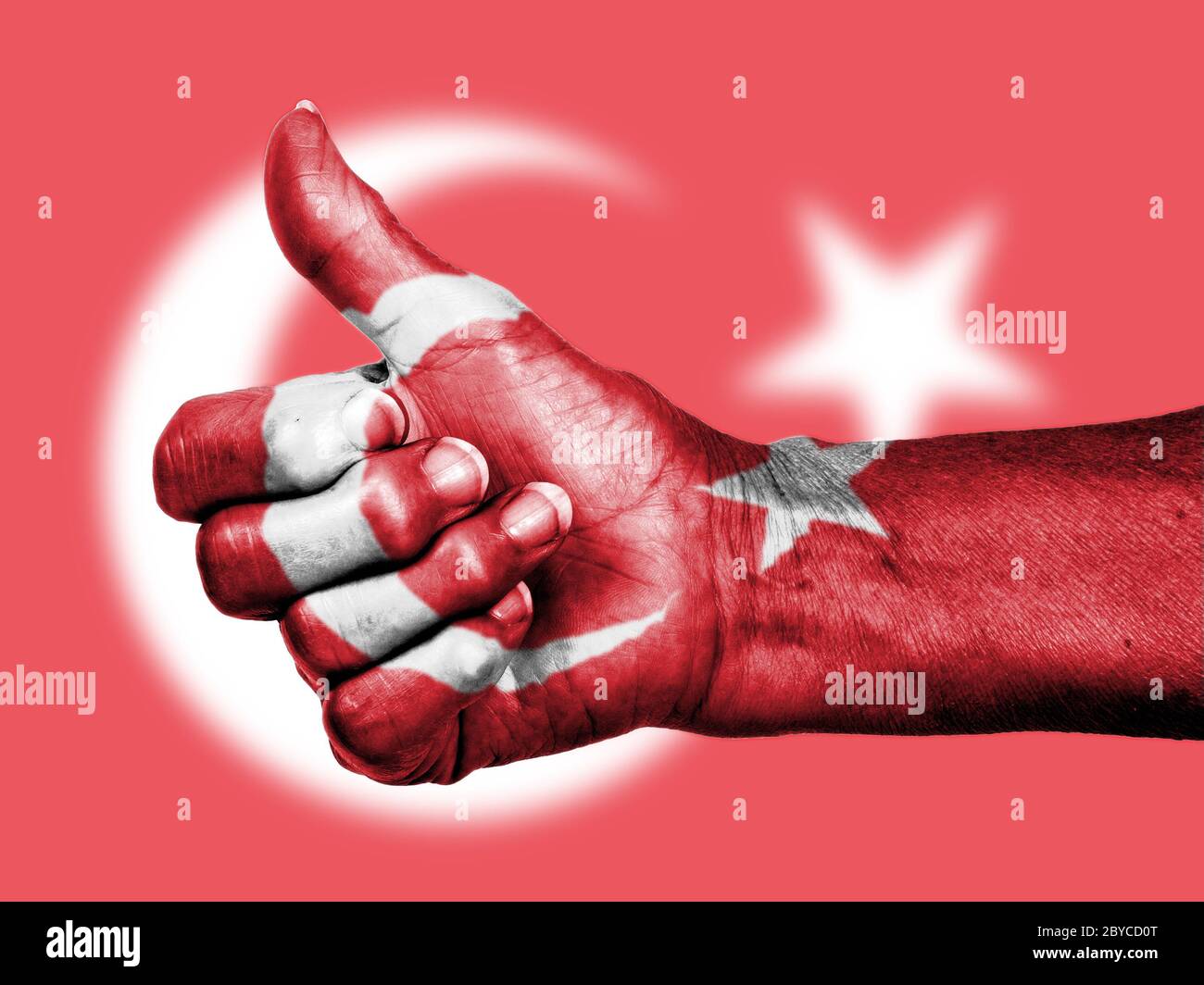 Turkey flag on thumbs up hand Stock Photo - Alamy