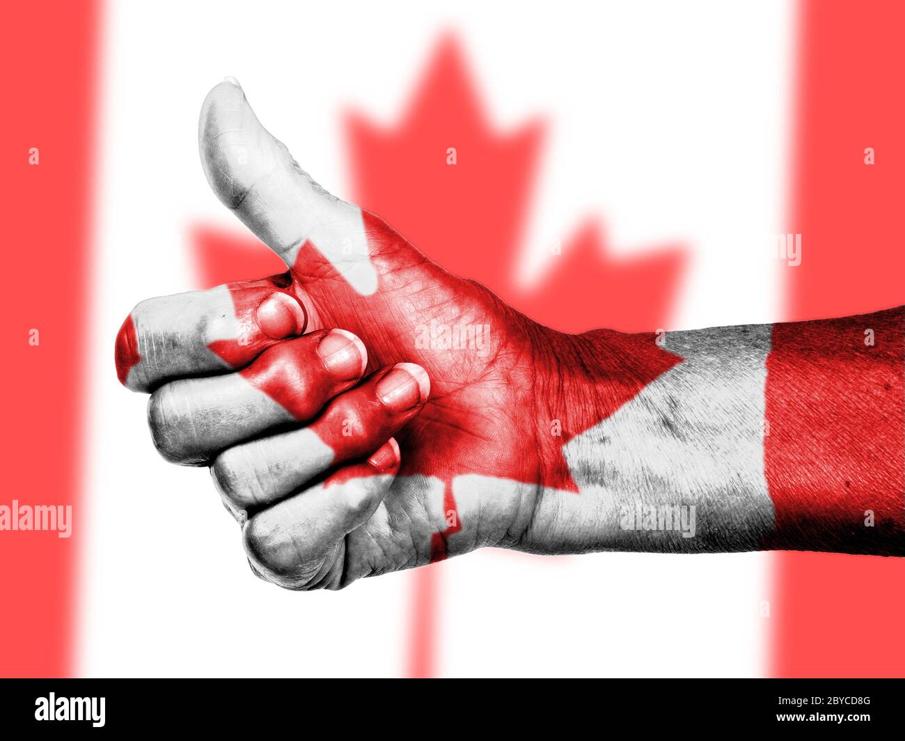 Canadian flag on thumbs up hand Stock Photo - Alamy