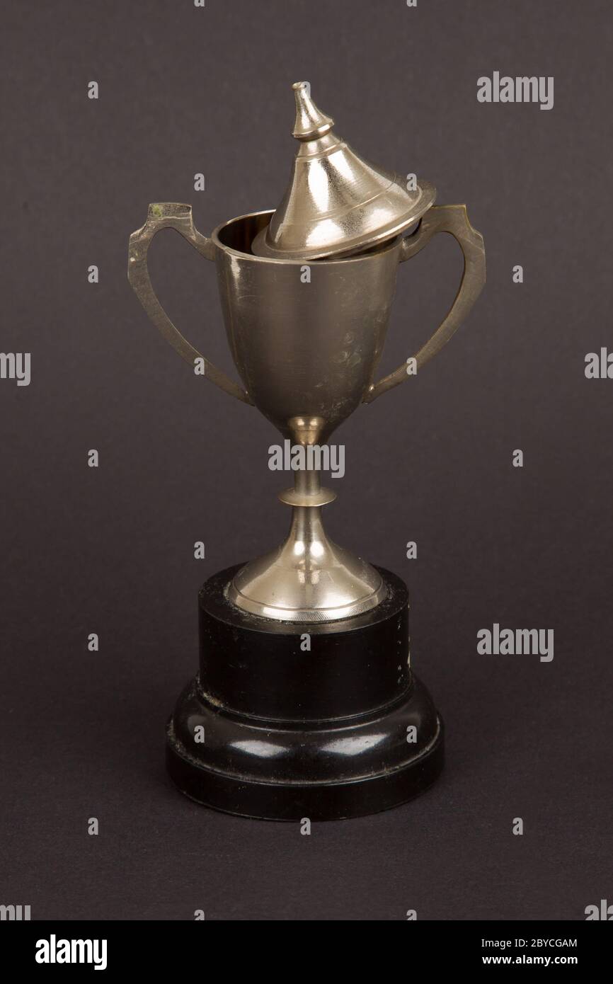 Very old trophy cup isolated Stock Photo - Alamy