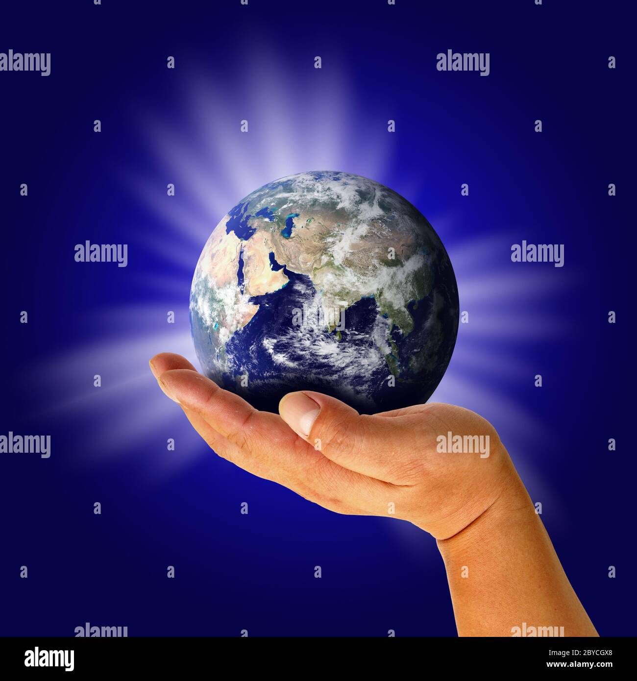 Earth in hand Stock Photo - Alamy