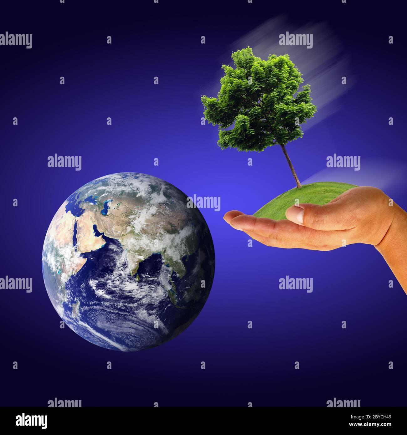 Earth with tree in hand Stock Photo - Alamy