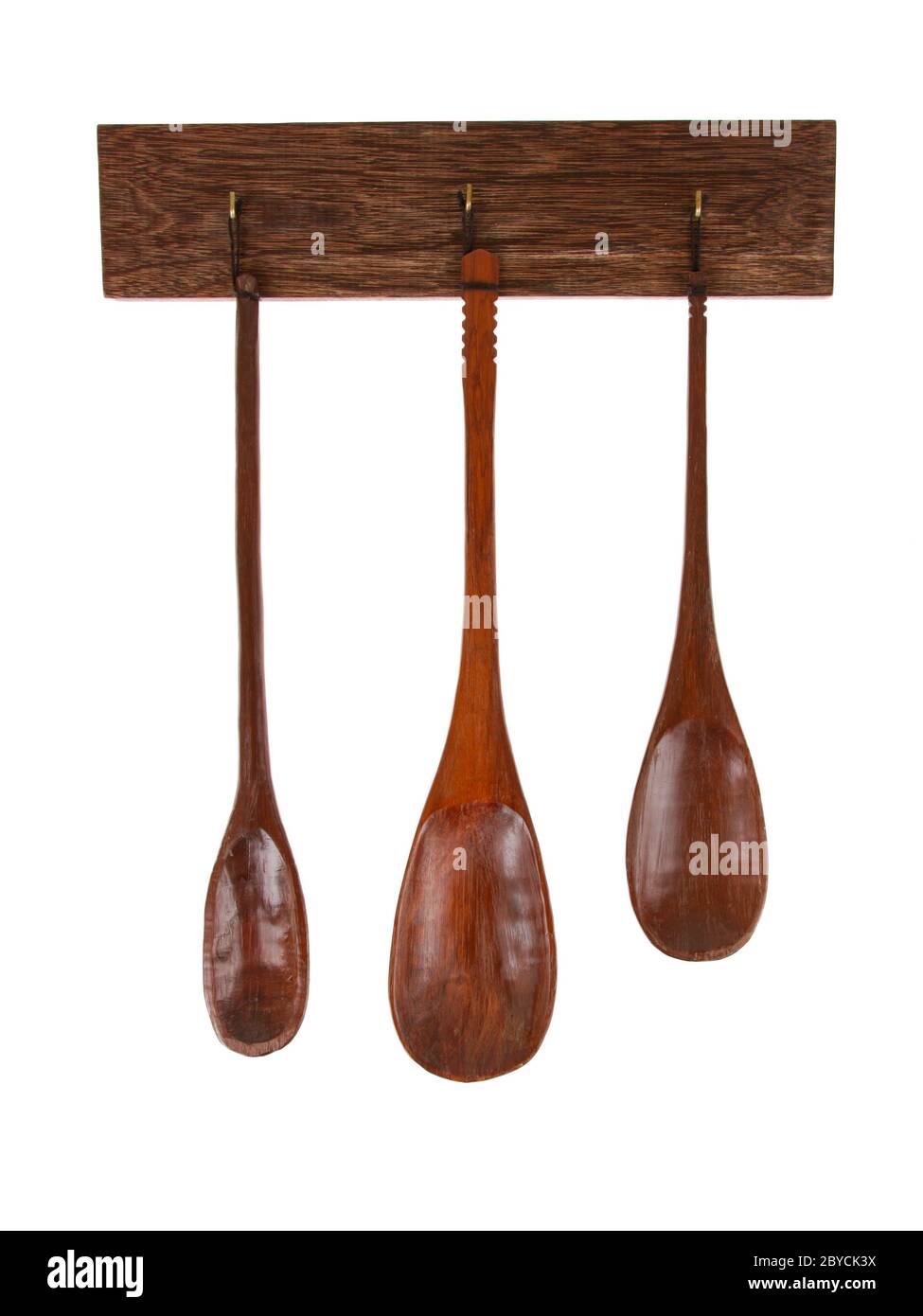 Wooden spoons isolated Stock Photo - Alamy