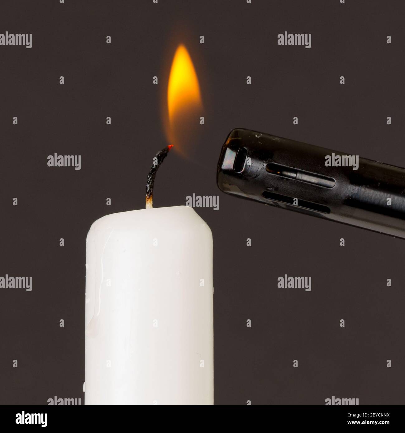 White candle isolated Stock Photo - Alamy