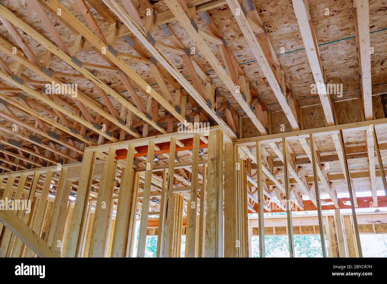 Framing home unfinished wood building or a house under construction ...