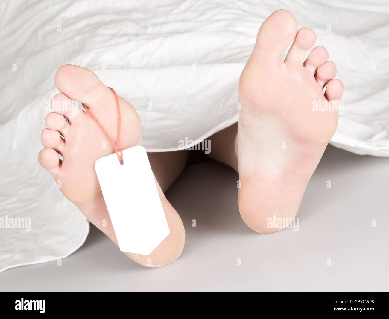 Dead body with toe tag Stock Photo - Alamy