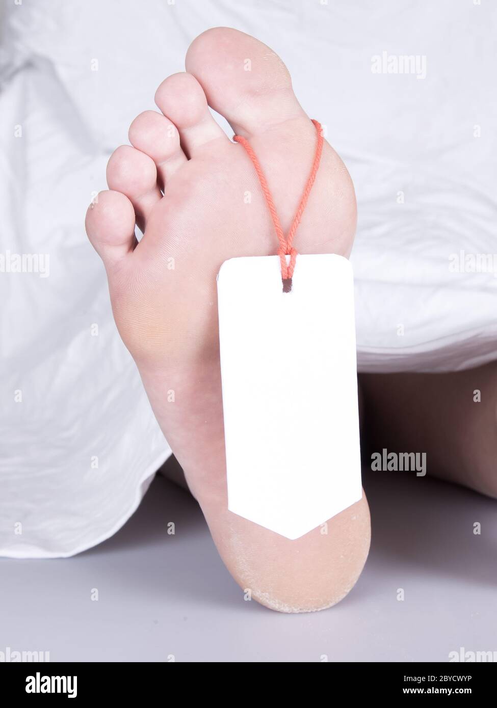 Dead body with toe tag Stock Photo - Alamy
