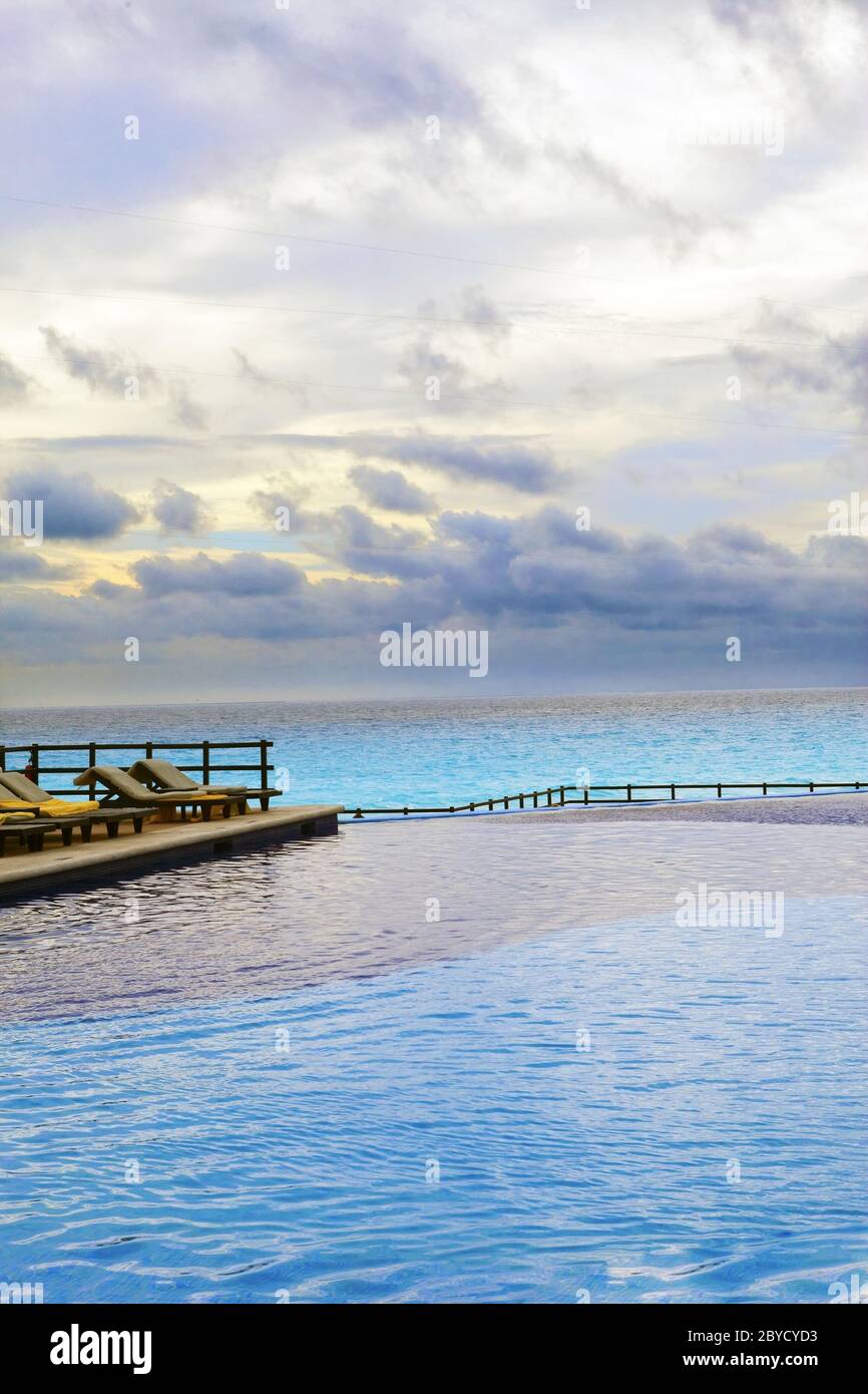 Empty swimming pool and ocean Stock Photo - Alamy
