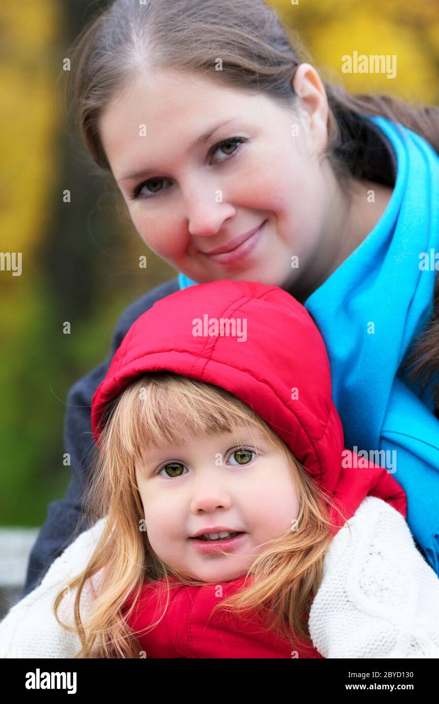 Beautiful Girl and Mom Portrait Stock Photo - Alamy