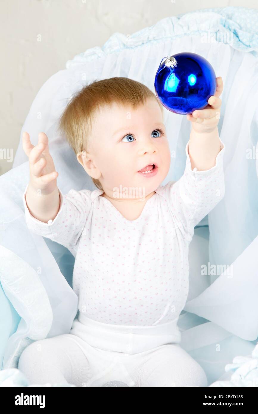 Cradle holding hi-res stock photography and images - Alamy