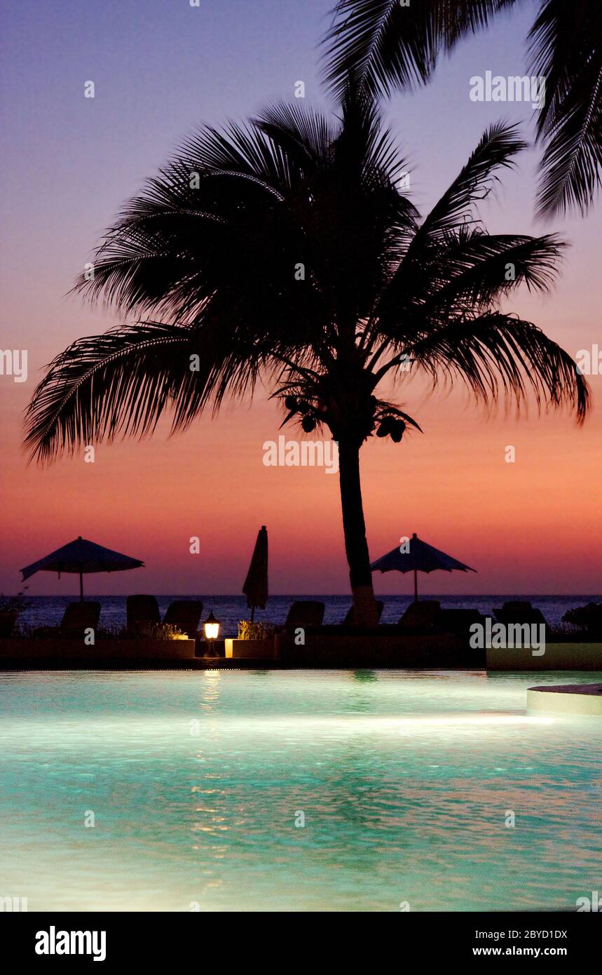 swimming pool sunset Stock Photo - Alamy
