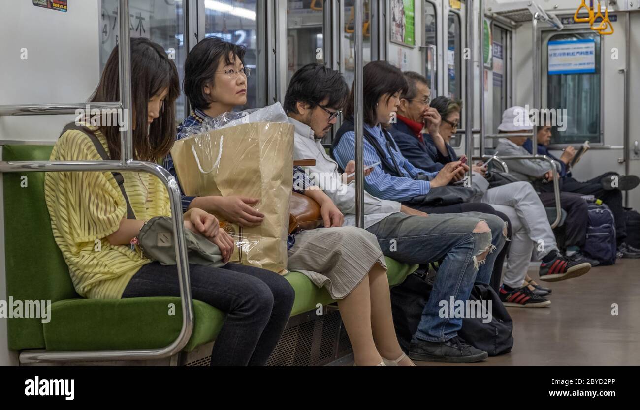 Packed train japan hi-res stock photography and images - Alamy