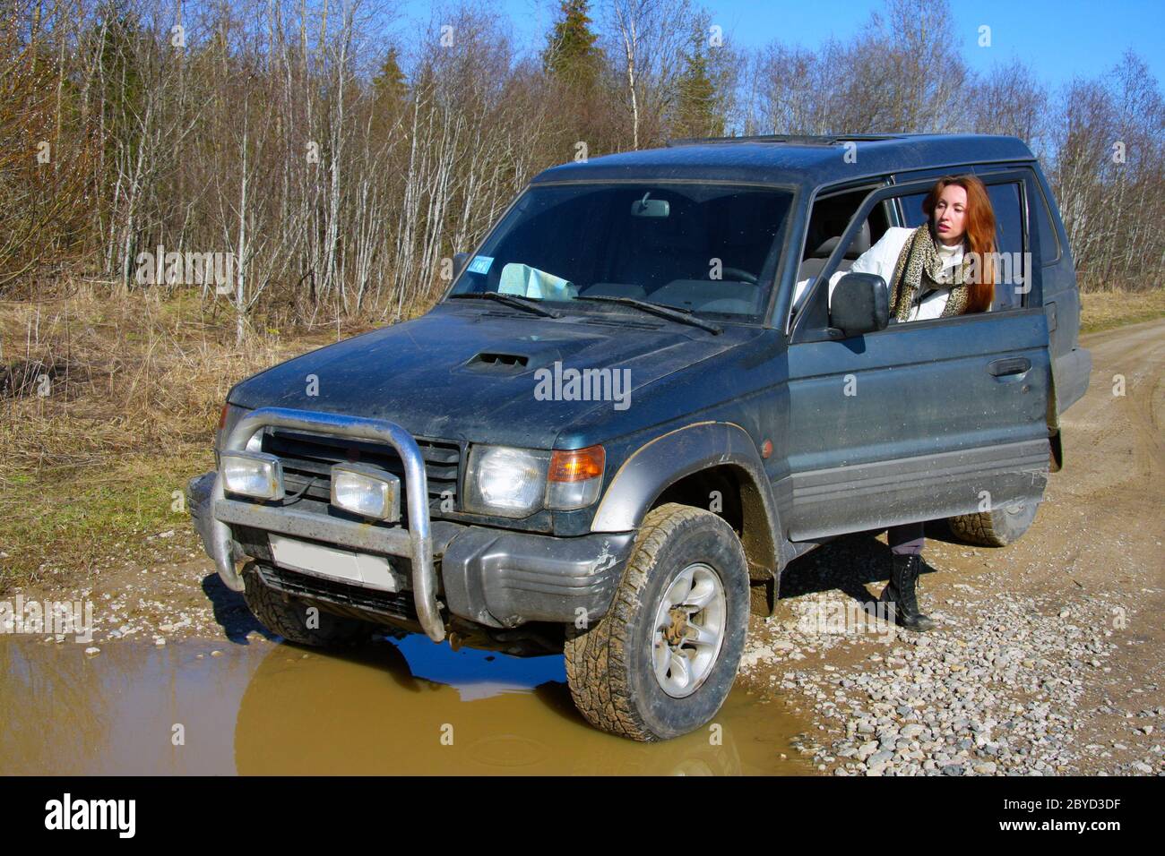 offroad car on dirt road Stock Photo - Alamy