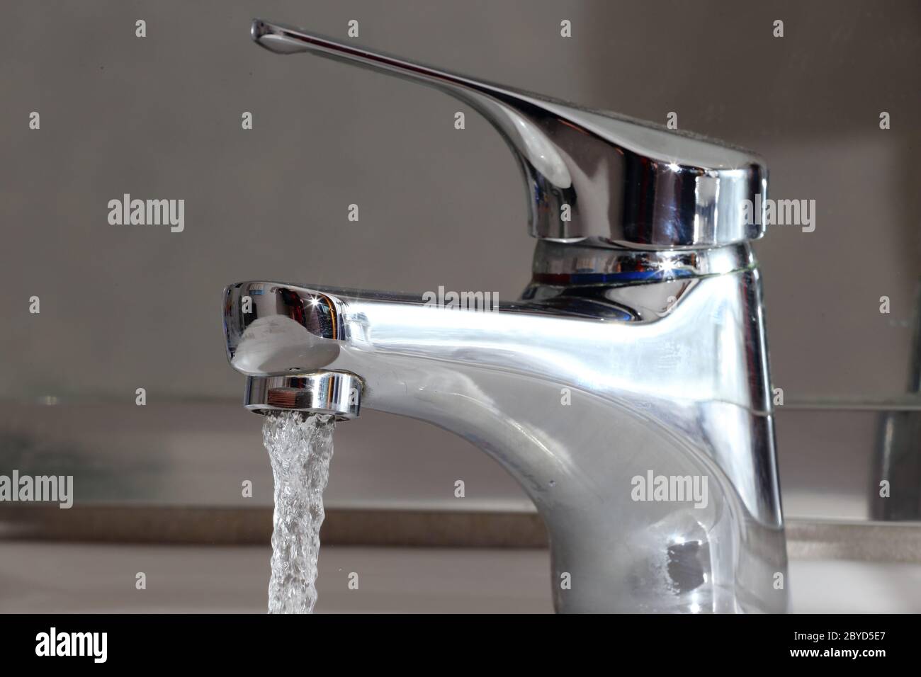 Running the tap hi-res stock photography and images - Alamy