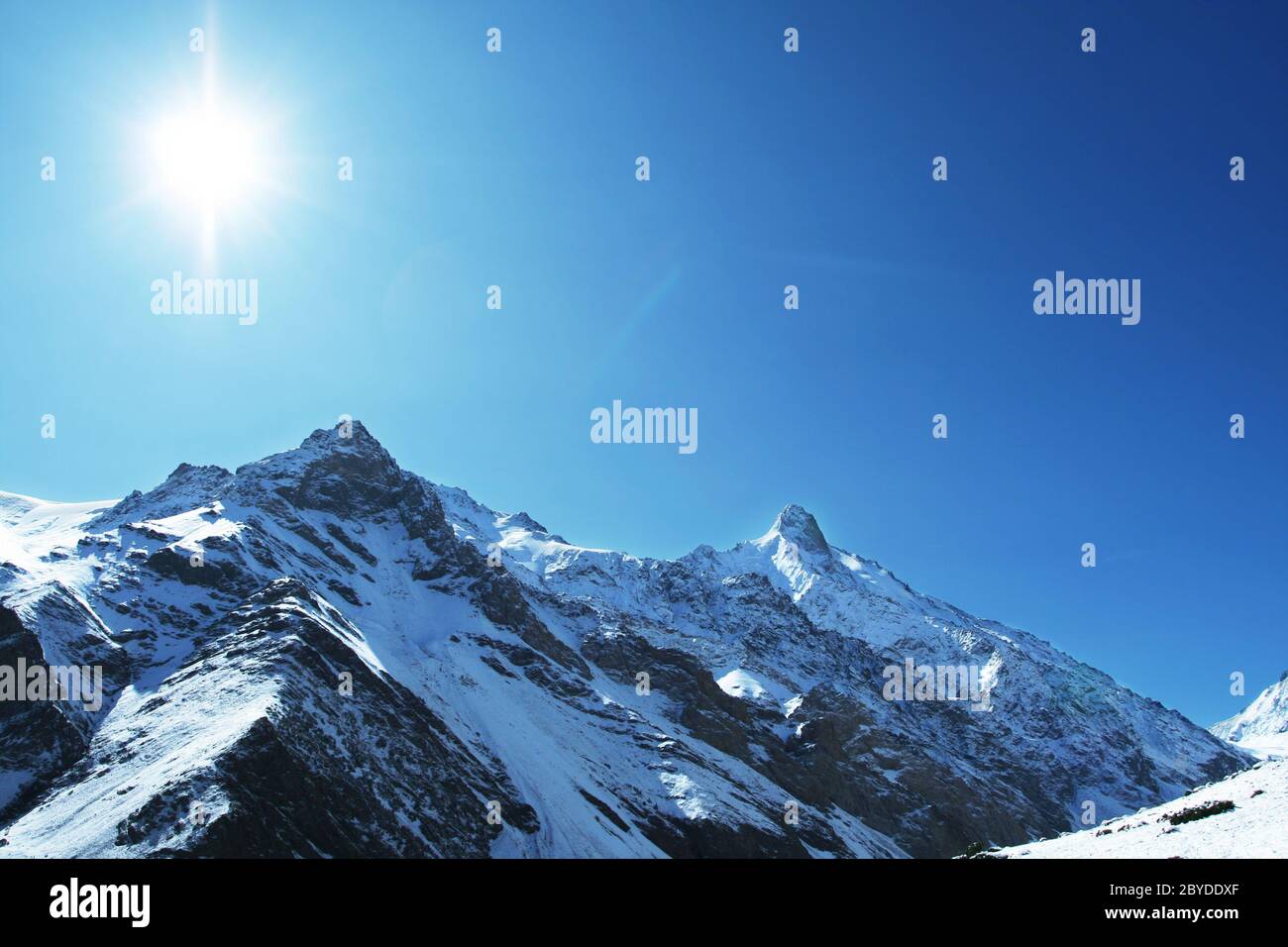 Sun and snow Stock Photo - Alamy