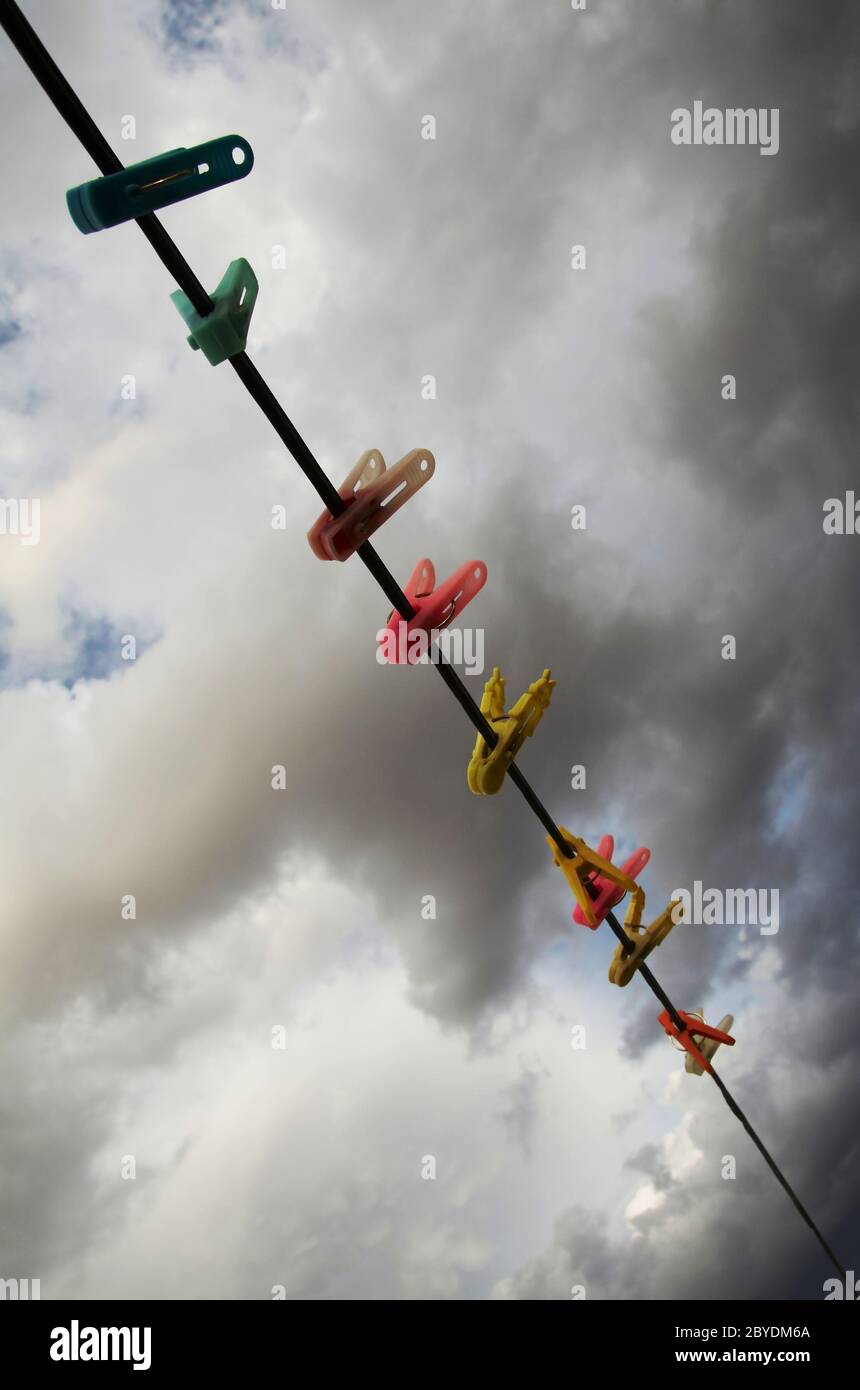 Clothes-line on the storm sky Stock Photo - Alamy