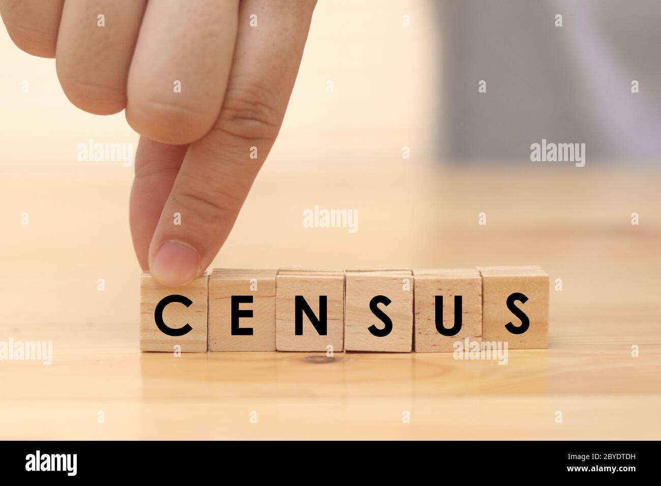 CENSUS, man arrange word text typography written on wooden alphabet ...