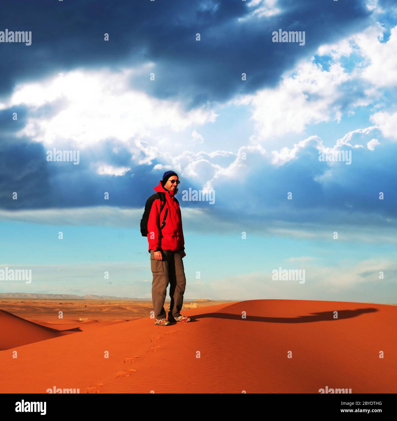 Men in desert Stock Photo - Alamy