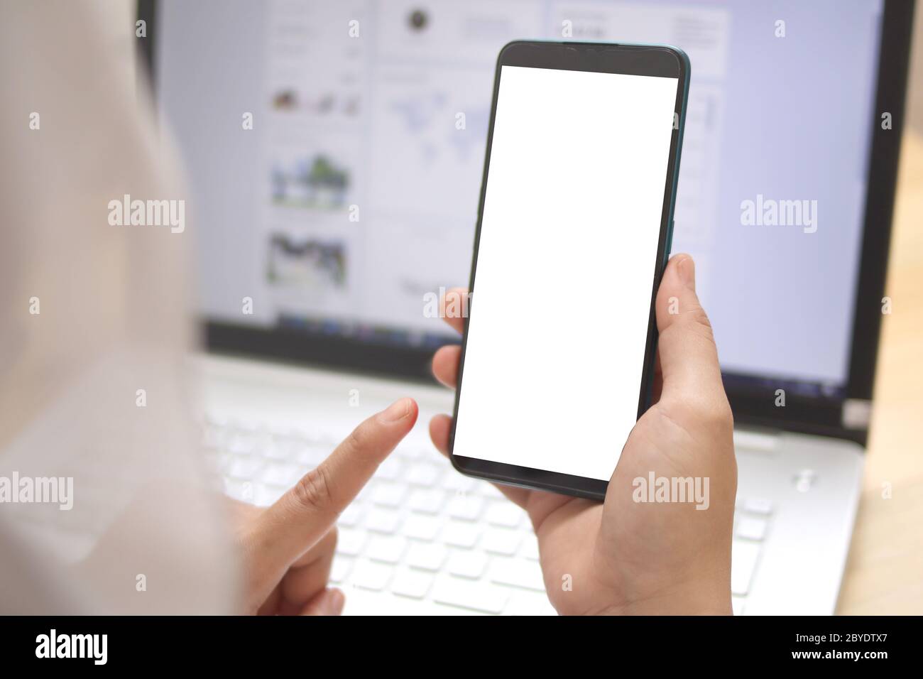Close up image of smart phone mockup, businesswoman holding phone with ...