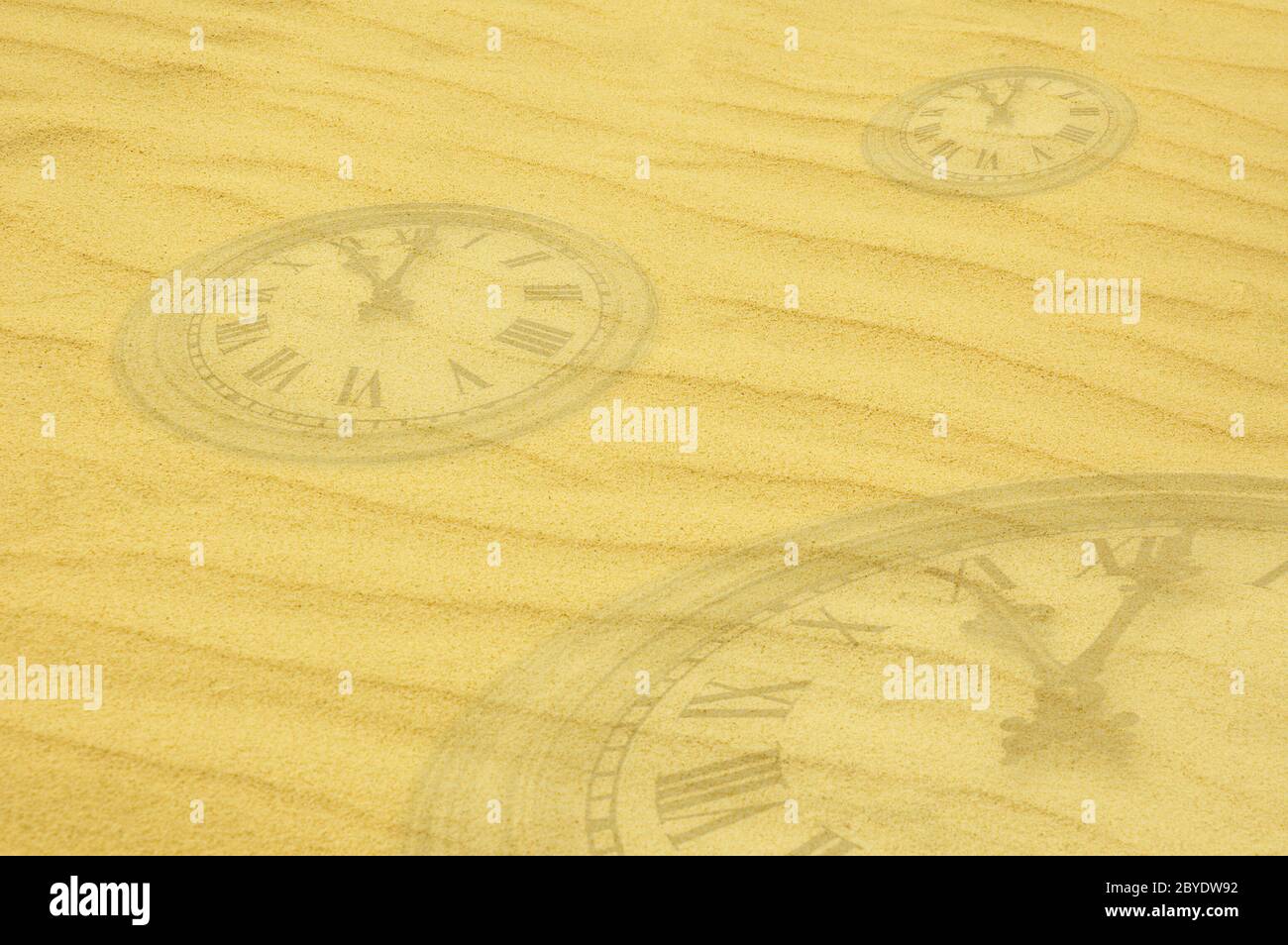 eternity background - clock faces dissolving in sand Stock Photo - Alamy