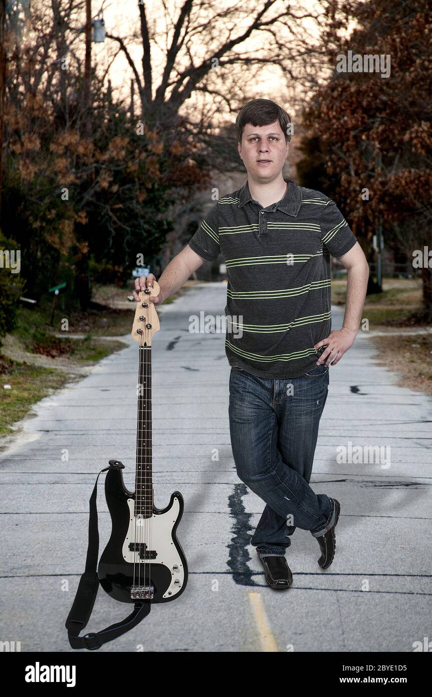 Man playing bass guitar hi-res stock photography and images - Alamy