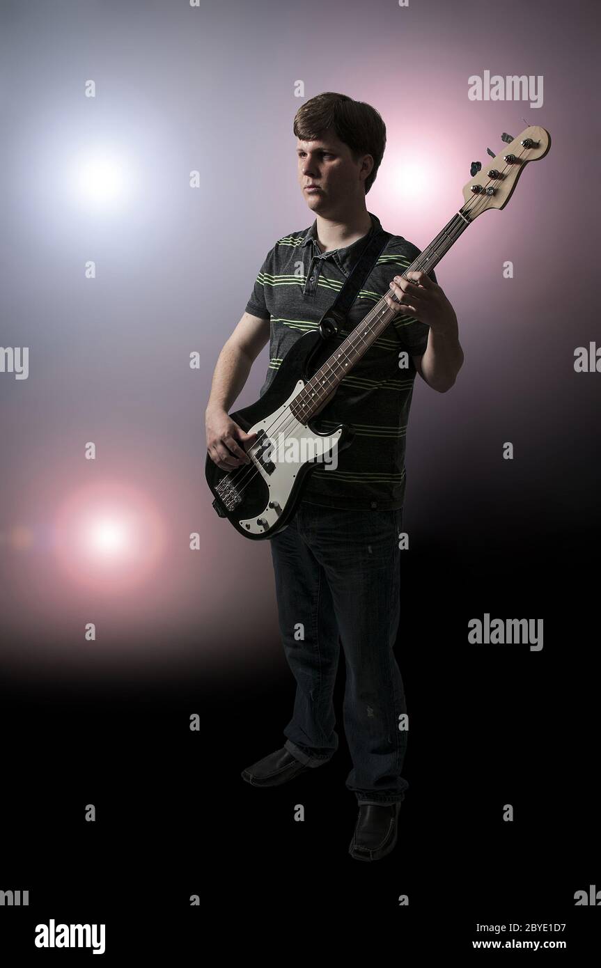 Man with Bass Guitar Stock Photo - Alamy