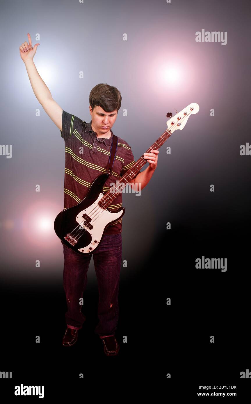 Man with Bass Guitar Stock Photo - Alamy