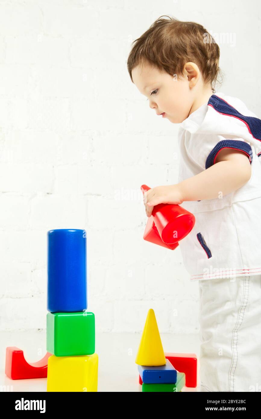 Photo of child playing hi-res stock photography and images - Alamy
