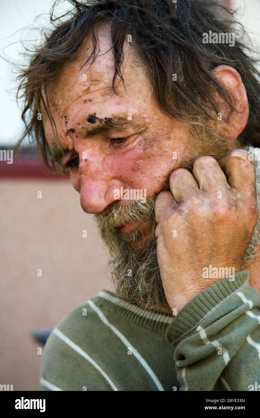 Homeless man in depression Stock Photo - Alamy