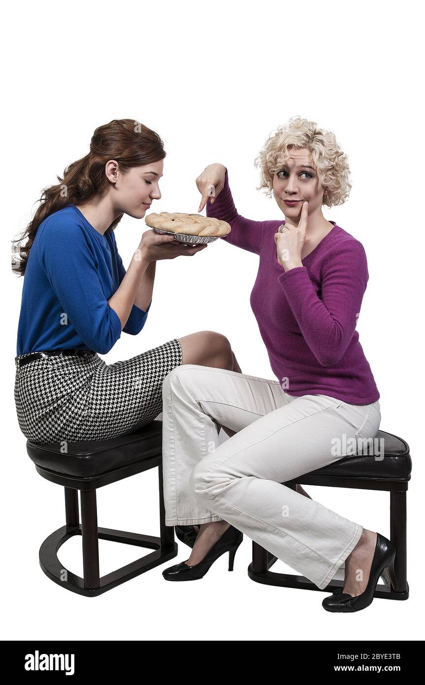 Girl showing apple pie Cut Out Stock Images & Pictures - Alamy