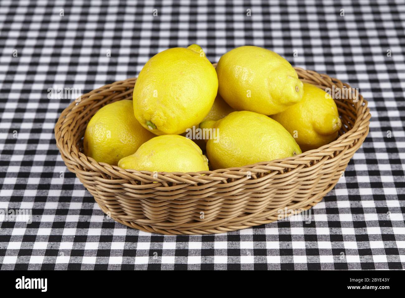 Basket with lemons Stock Photo - Alamy