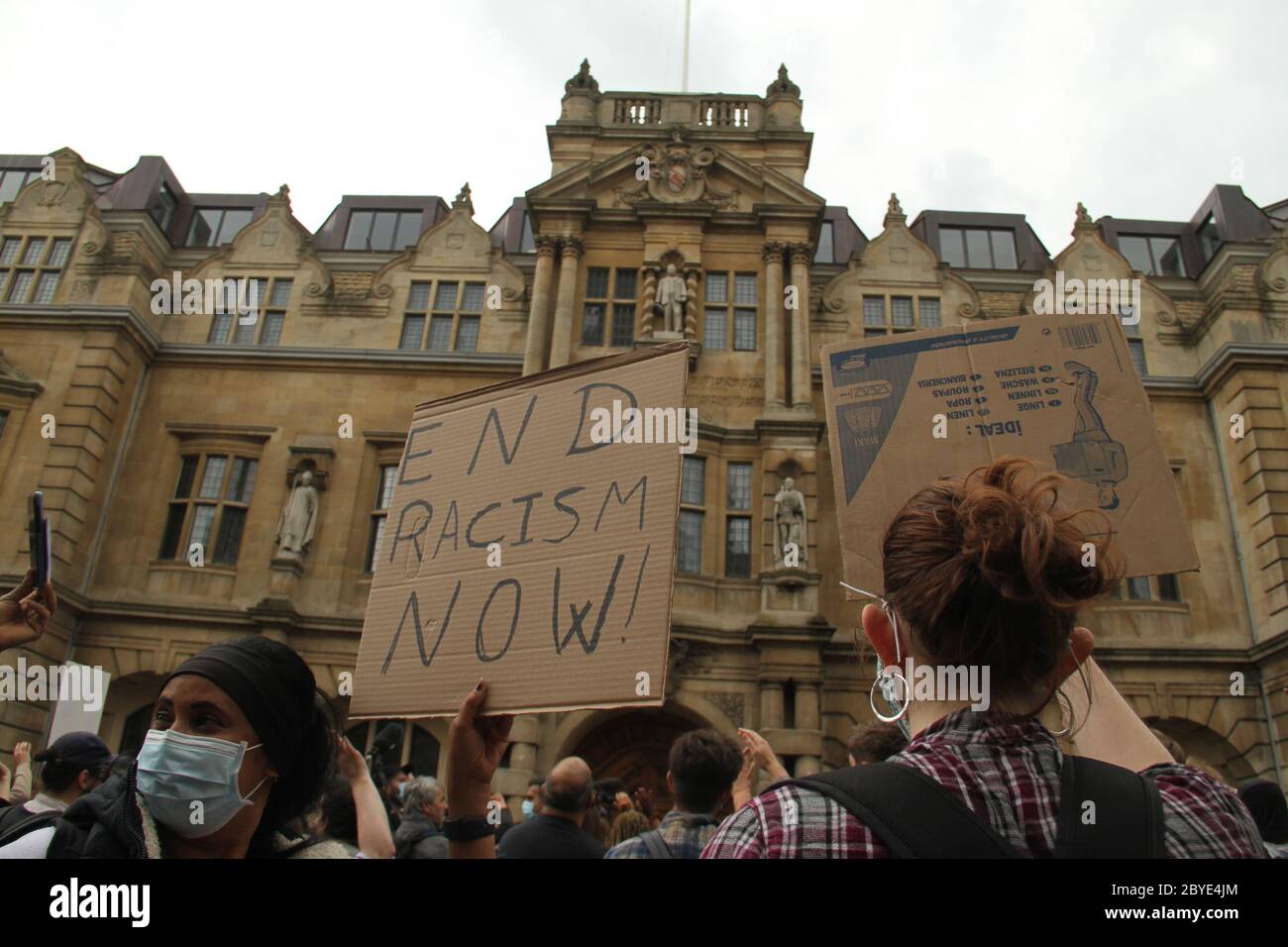 Protesters hold placards during the demonstration.The Rhodes Must Fall ...