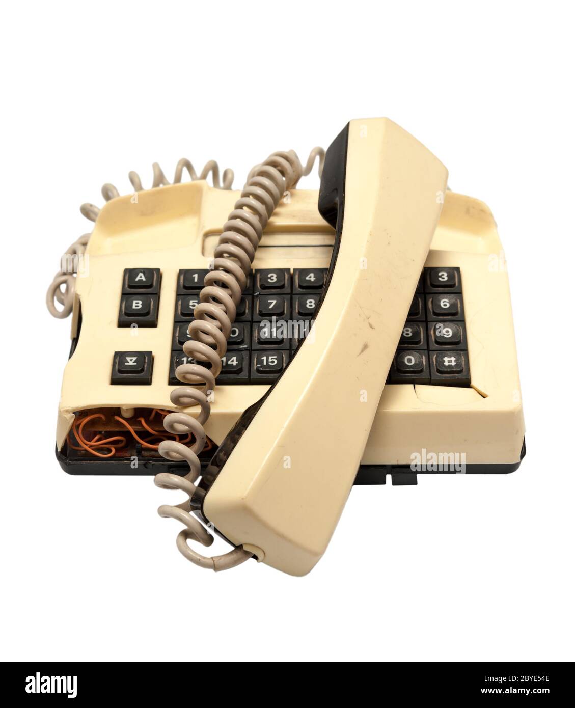 Telephone collection - crashed phone on white back Stock Photo - Alamy