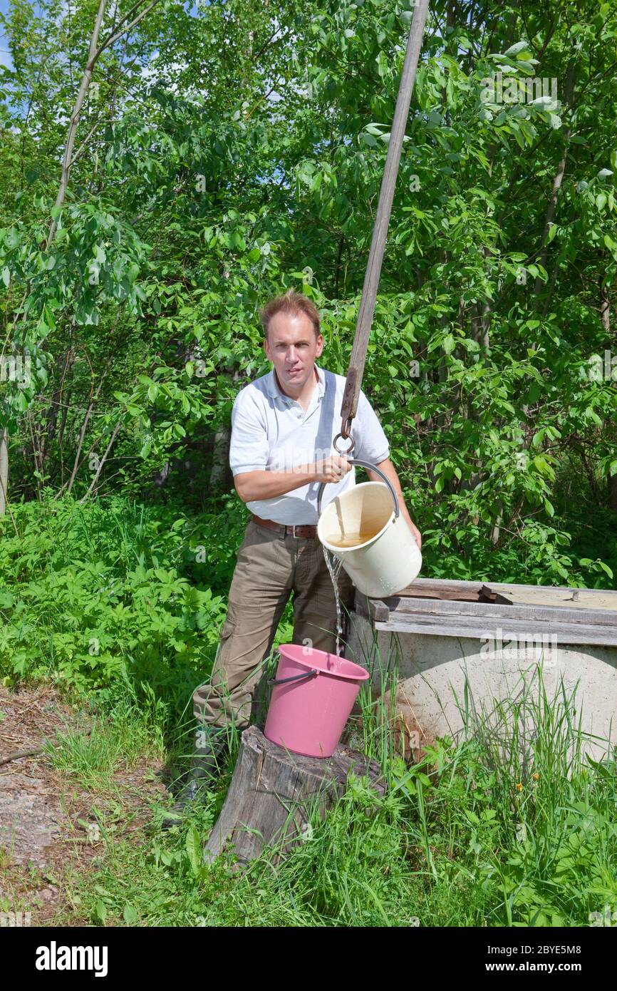 Man bucket hi-res stock photography and images - Alamy