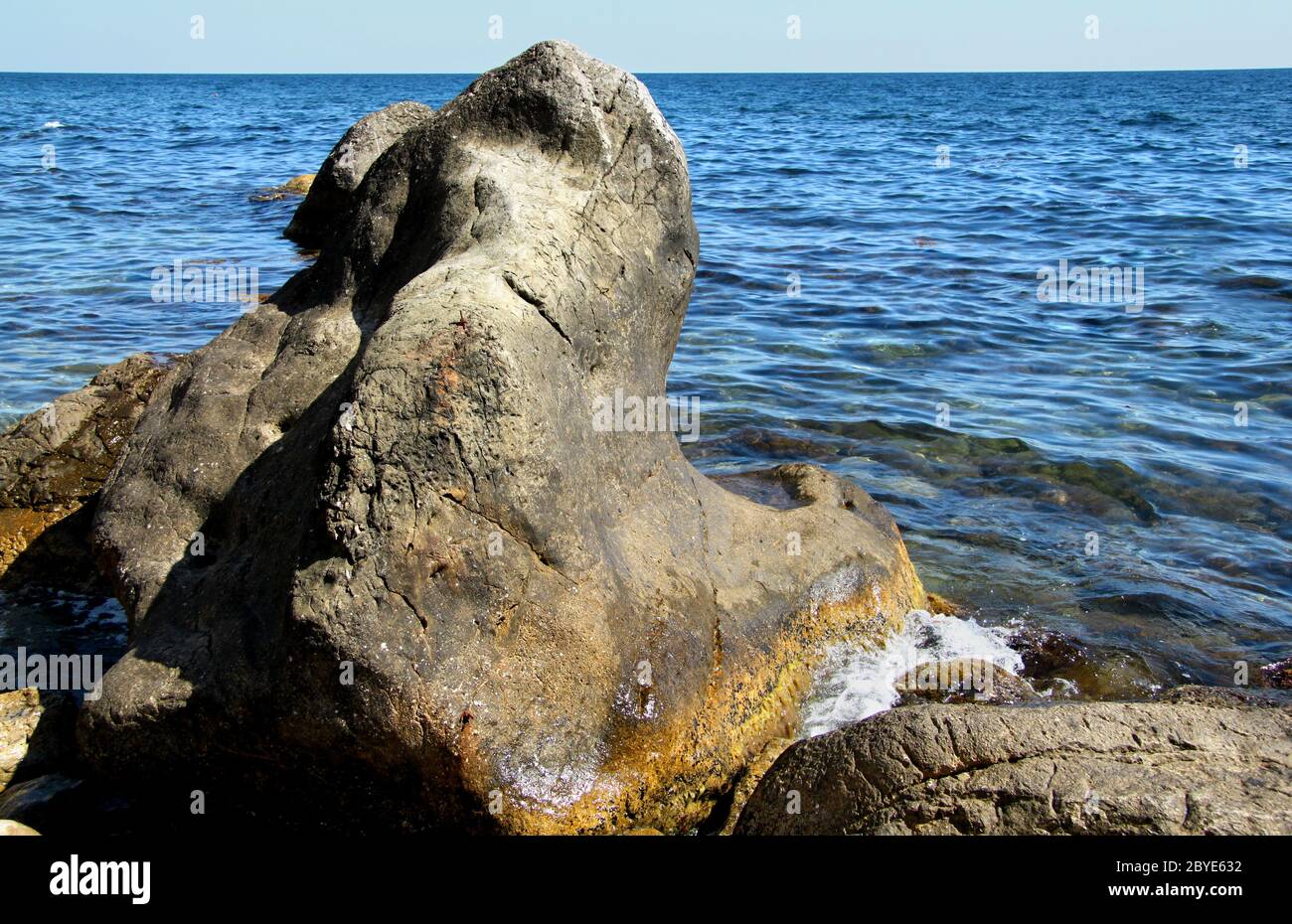 Beautiful beach big stone background hi-res stock photography and ...