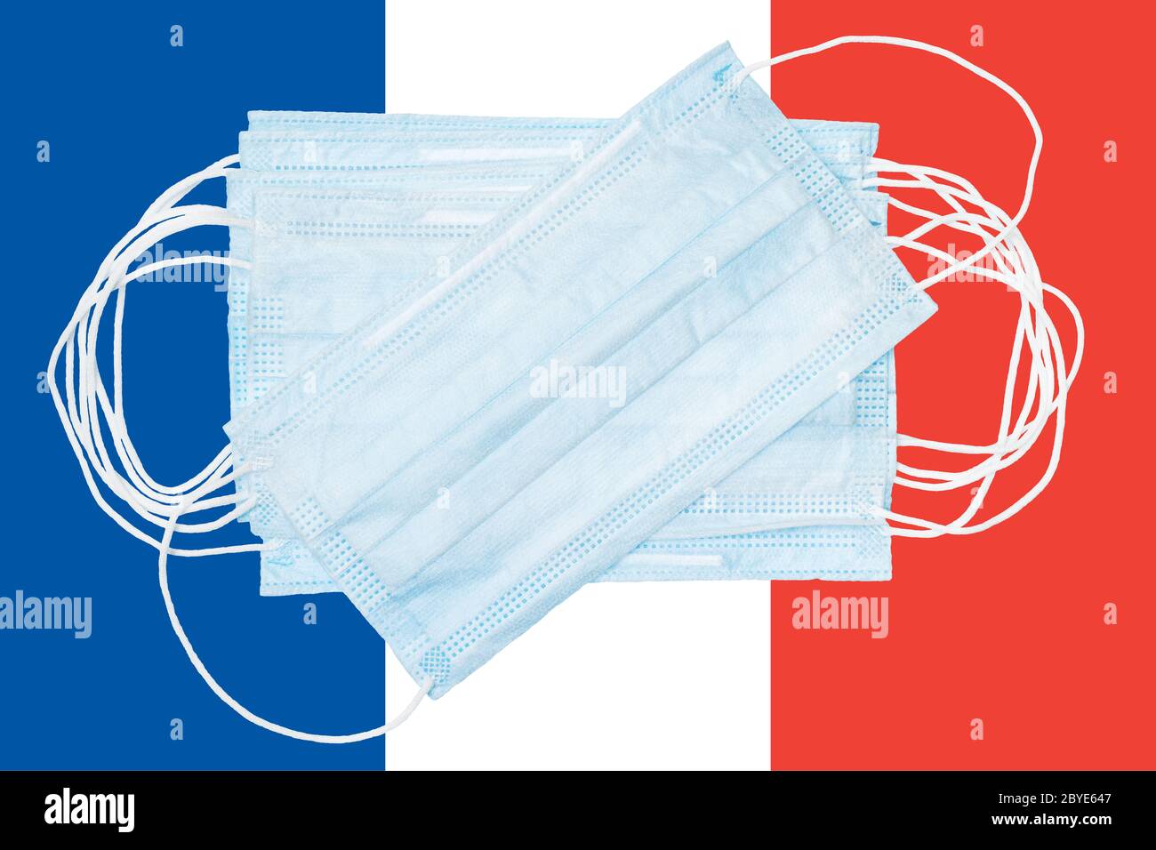 Group protective medical surgical face masks on background colors flag ...