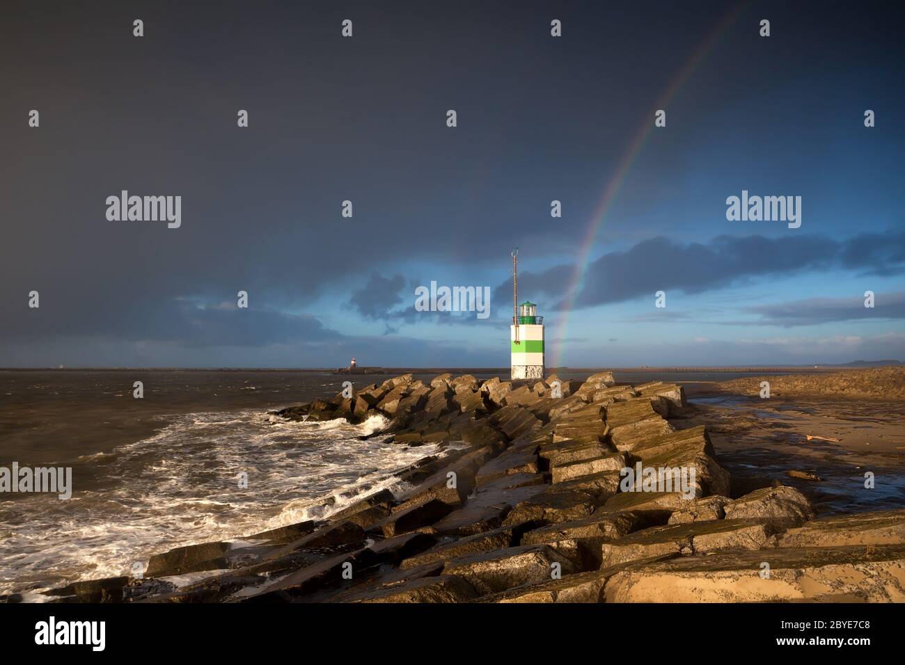 rainbow over lighthouse and North sea Stock Photo - Alamy
