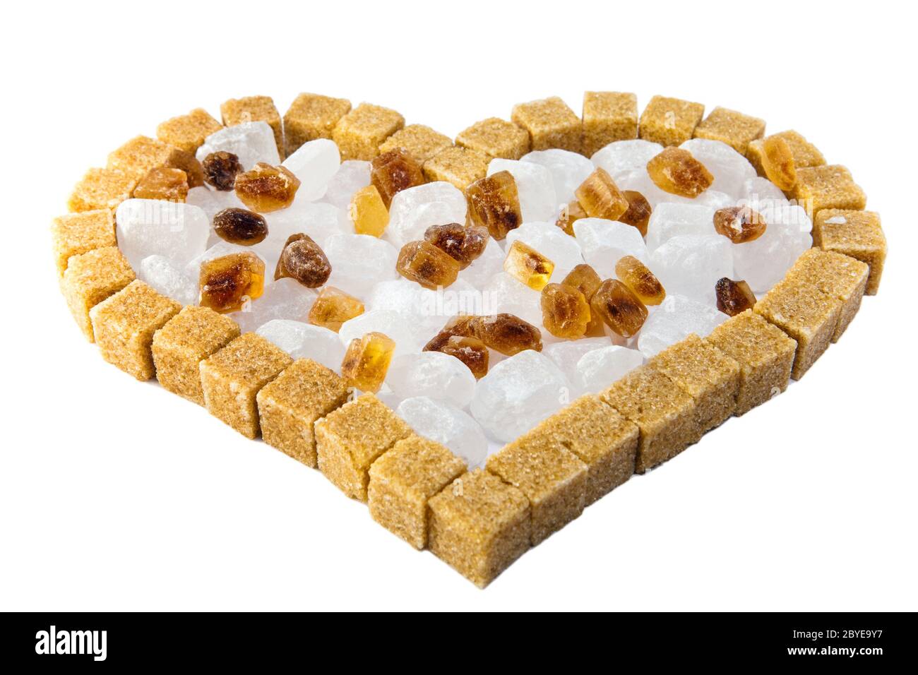 Heart from not refined reed granulated sugar Stock Photo - Alamy