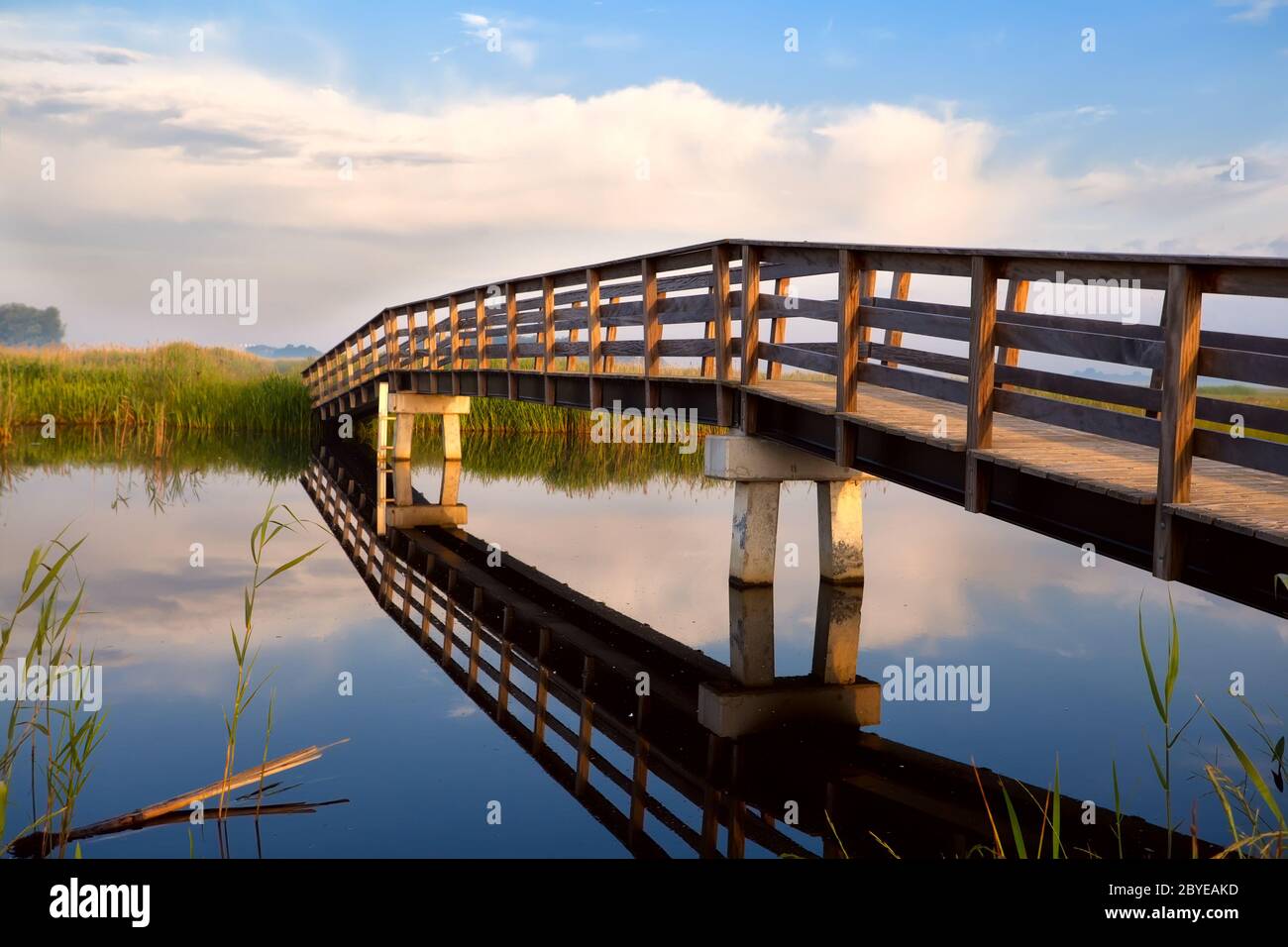 wooden bridge over river Stock Photo - Alamy