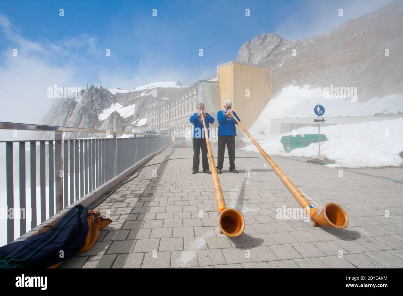 Alpine horns Player Stock Photo - Alamy