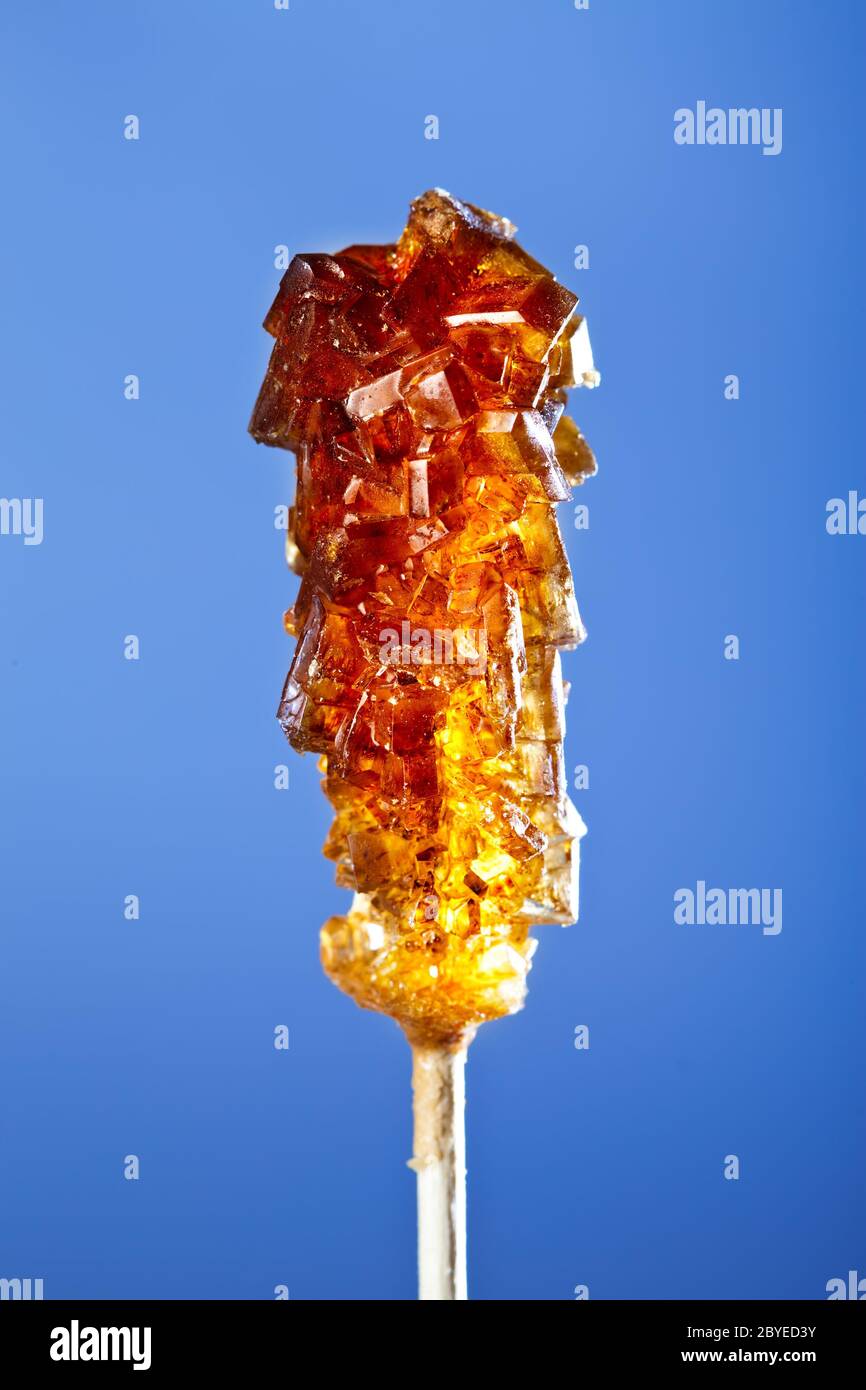 candy brown sugar on a stick Stock Photo - Alamy